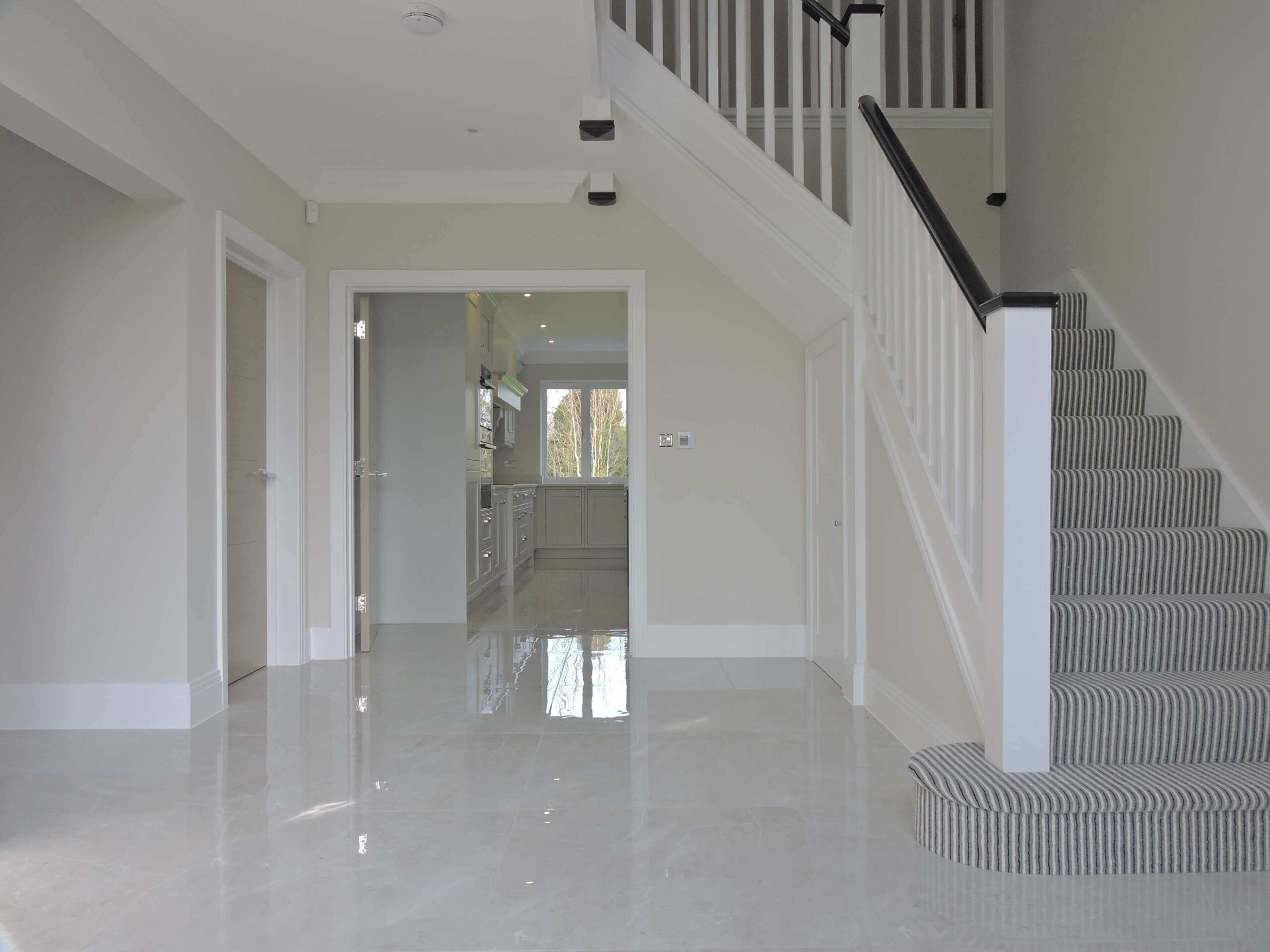 White Wooden Spindles with Dark Wood Rail Stairs | Roe Stairs